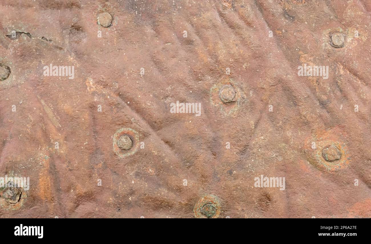 Steampunk Abstract background of old riveted copper sheet cladding ...
