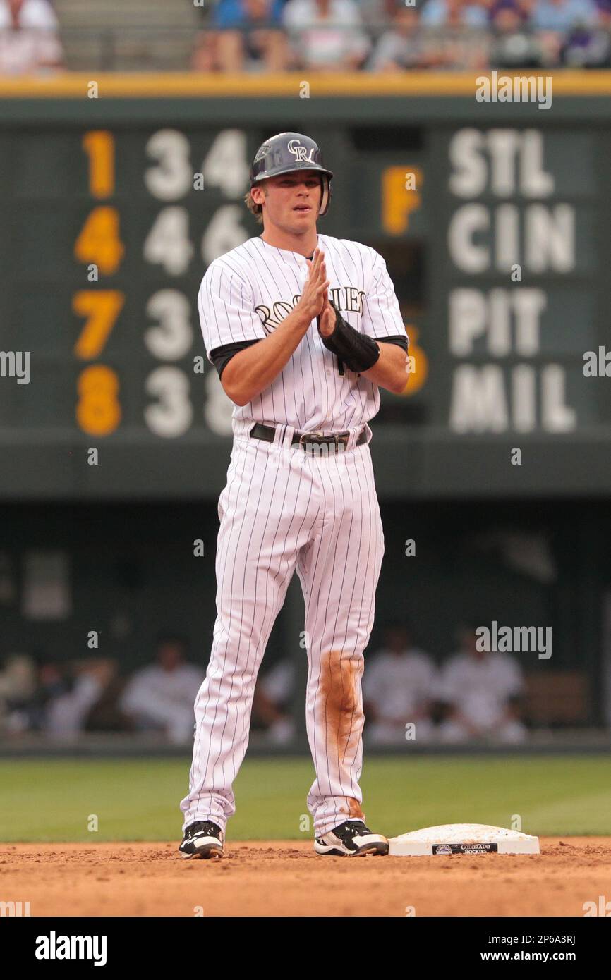 Colorado Rockies shortstop Josh Rutledge (14) waits at second base in a ...