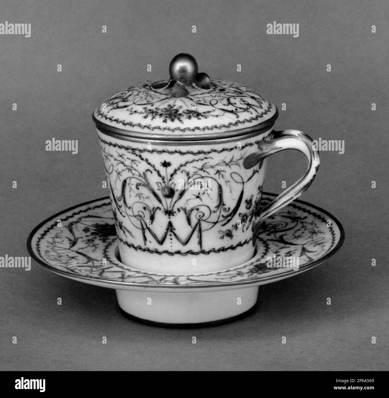 Porcelain covered cup saucer hi-res stock photography and images - Alamy