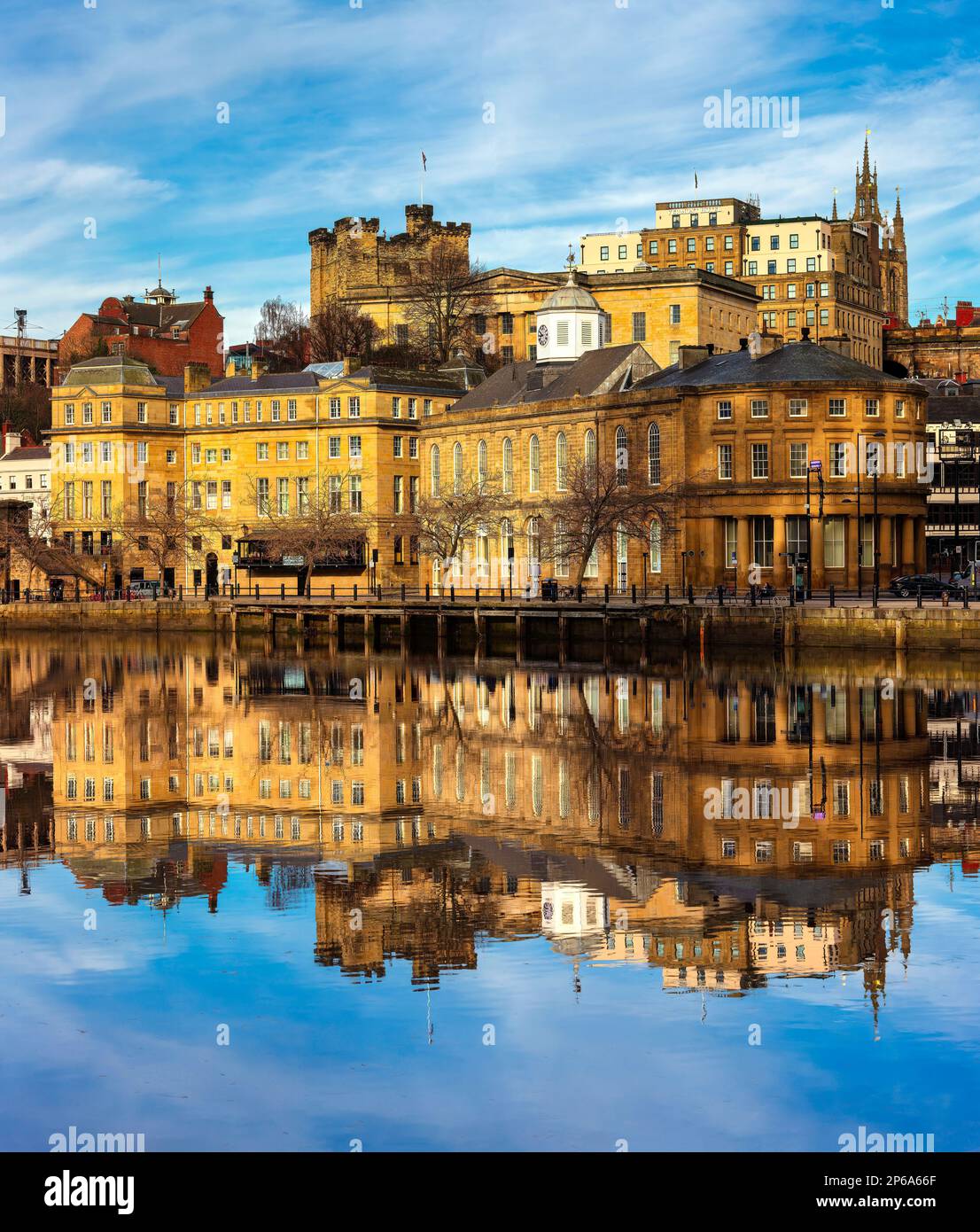 Early morning view in winter of Newcastle quayside reflected in the ...