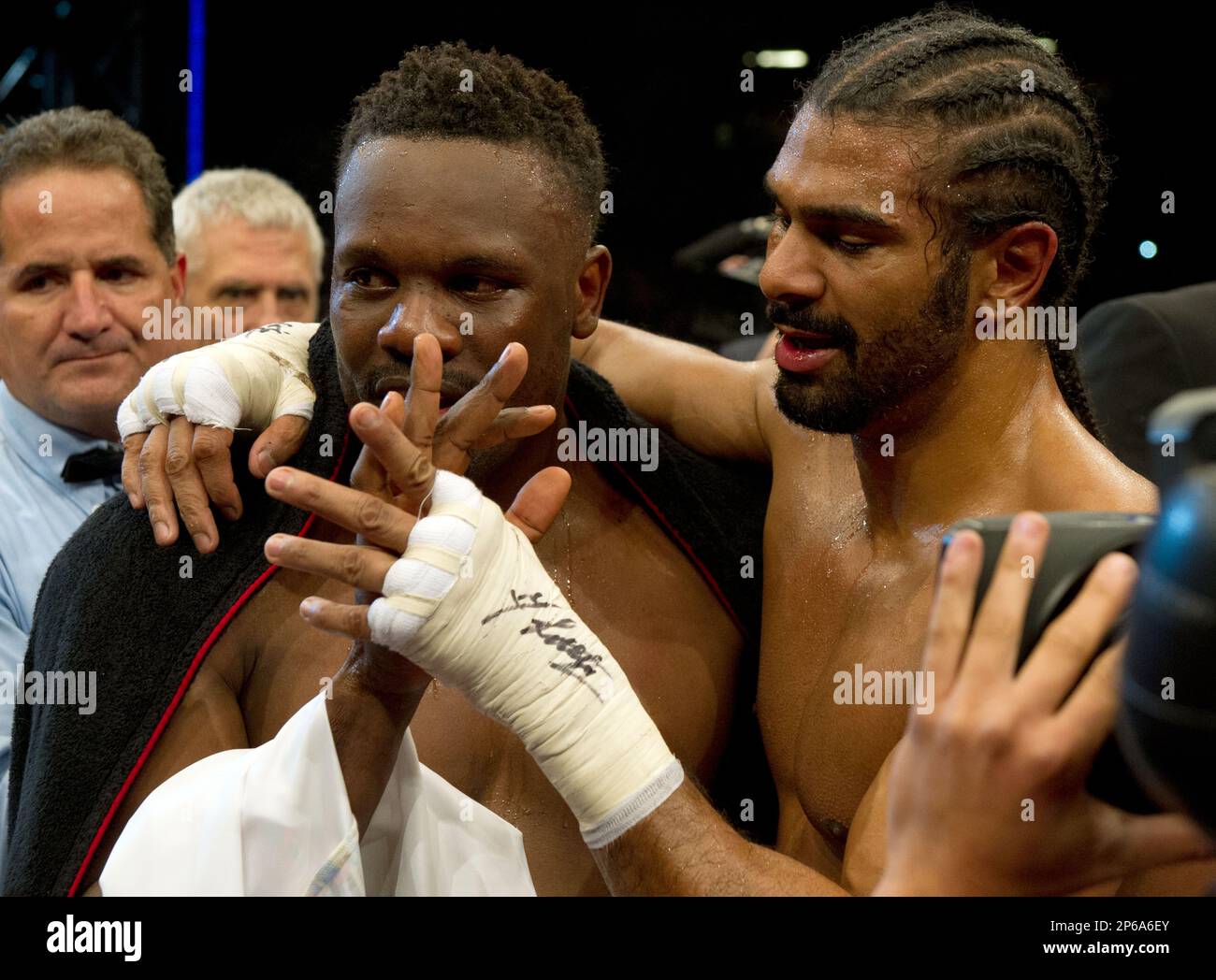 David Haye, right, and Dereck Chisora embrace after their international ...