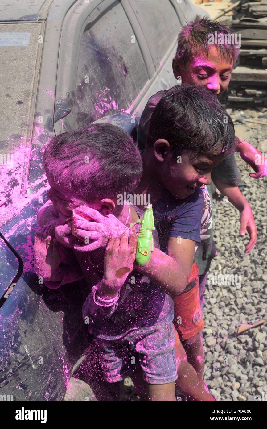 Non Exclusive: March 7, 2023, Kolkata, India: Children smear colors ...
