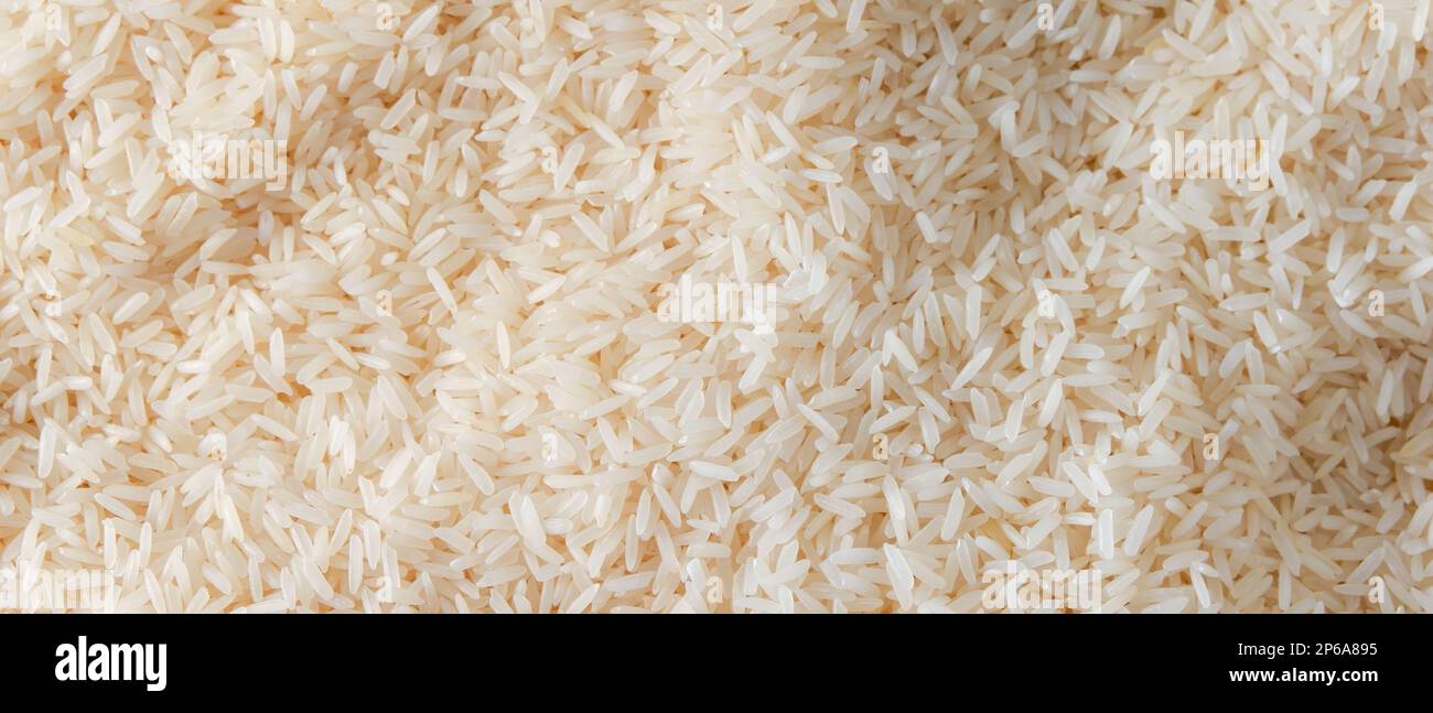 White long rice background texture Stock Photo - Alamy