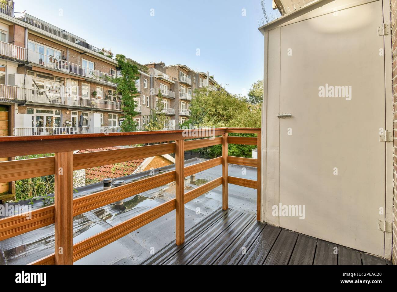 Amsterdam, Netherlands - 10 April, 2021: a balcony with wooden railings ...