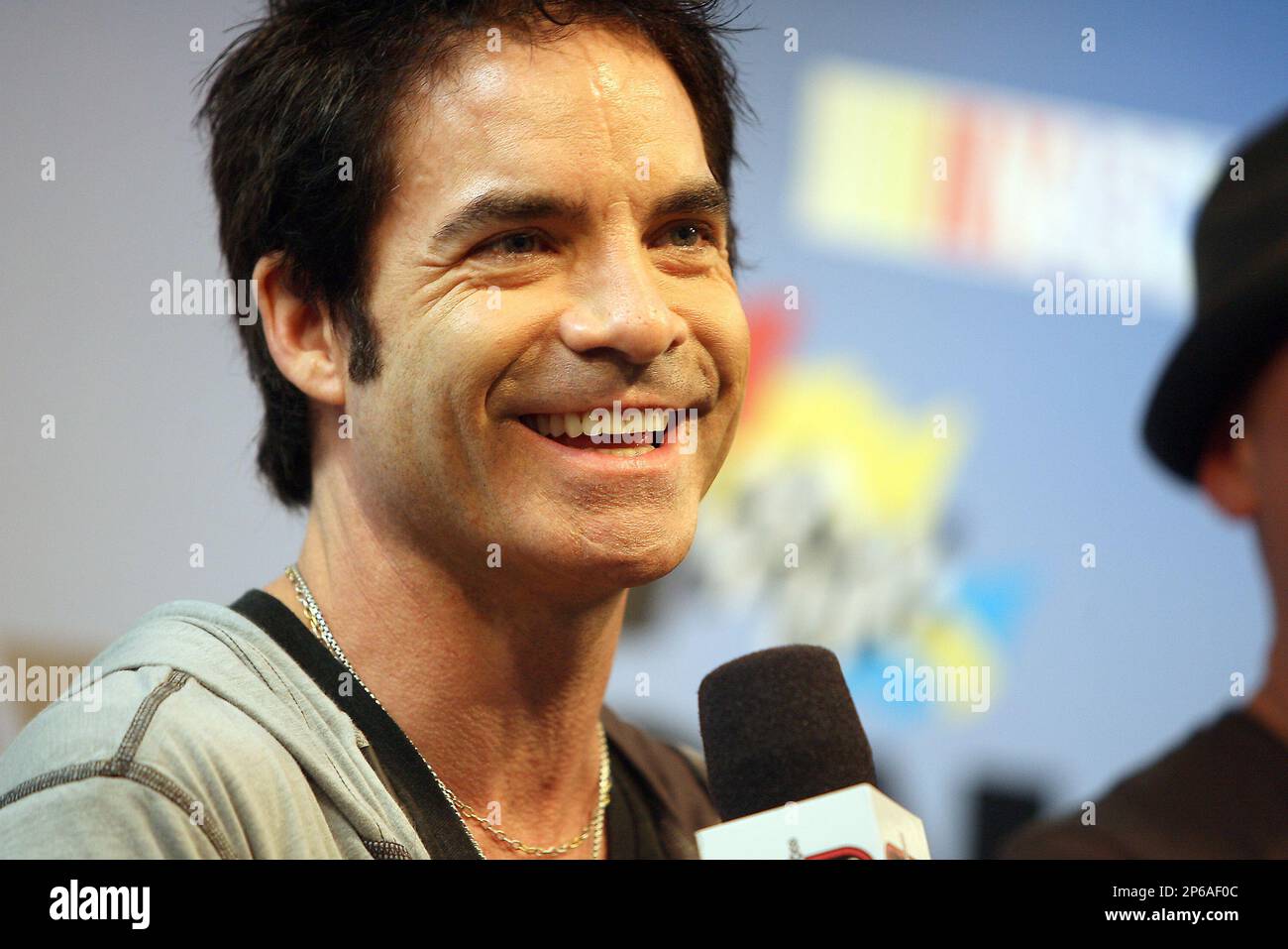 Pat Monohan, lead singer of the band Train speaks prior to the NASCAR ...