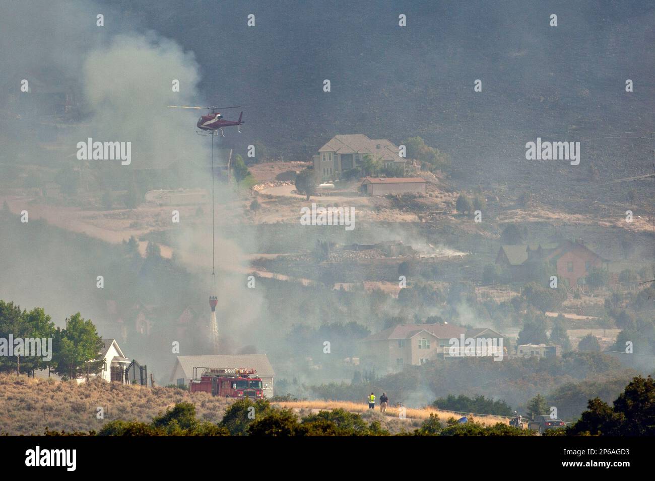 The Rose Crest Fire burns around Herriman Friday June 29, 2012. As of ...