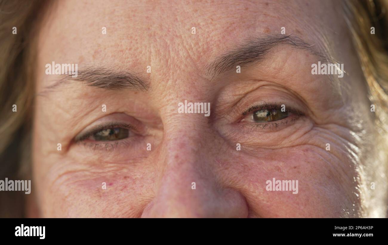 Senior woman opening eyes hi-res stock photography and images - Alamy