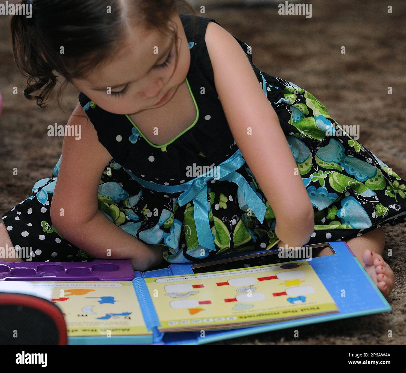 In this June 18, 2012, photo, Ella Kaye Wagner works on an exercise in ...