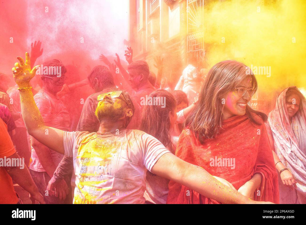 People play with colorful powders during the Holi festival. Holi is a ...