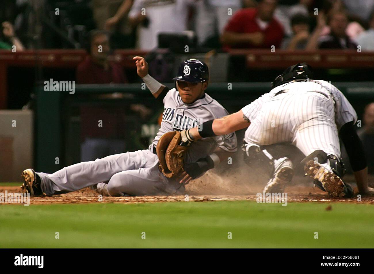 JUNE 27 2012: San Diego Padres pinch runner Alexi Amarista #5 is tagged ...