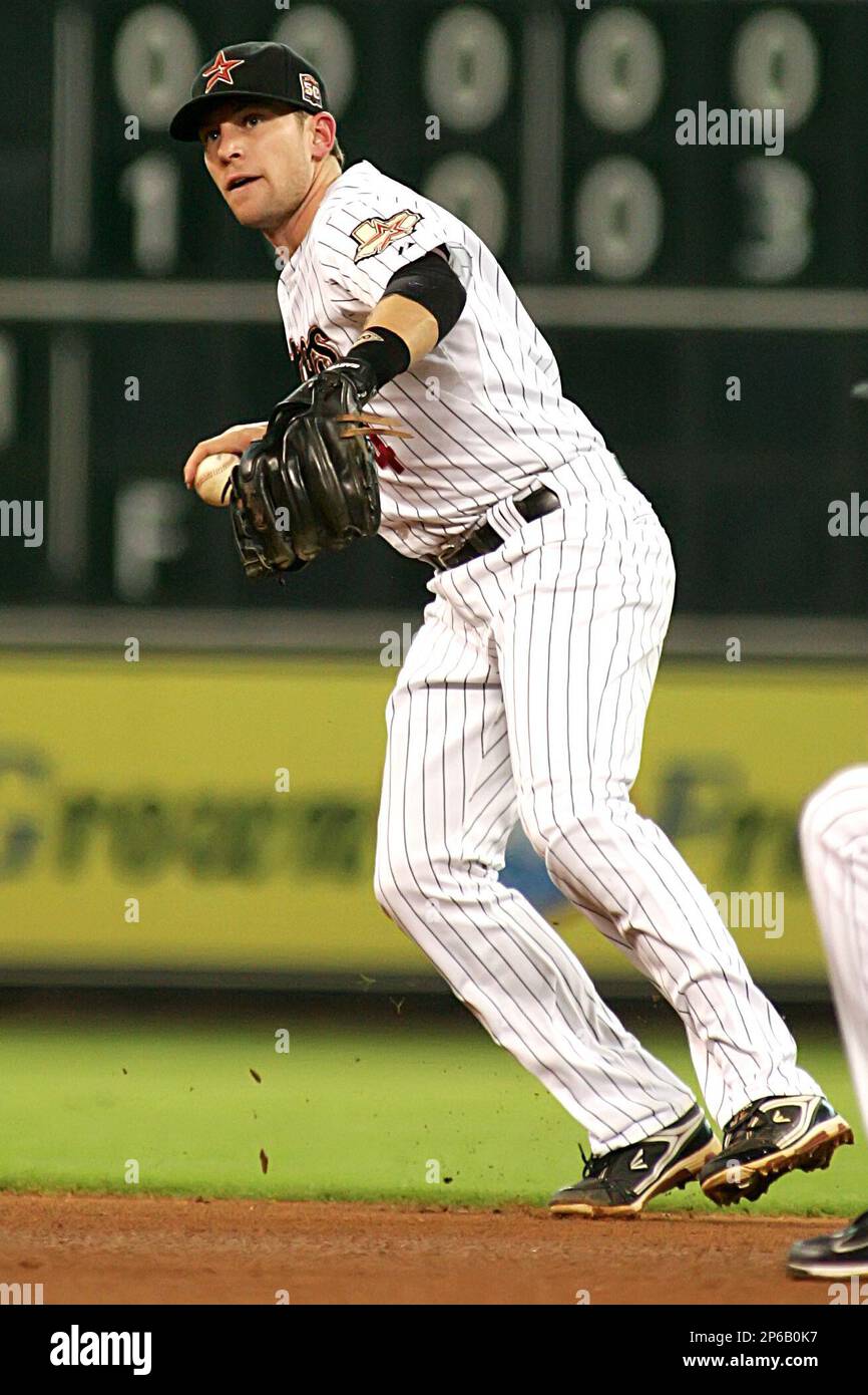 JUNE 27 2012: Houston Astros shortstop Jed Lowrie #4 reaches back to ...