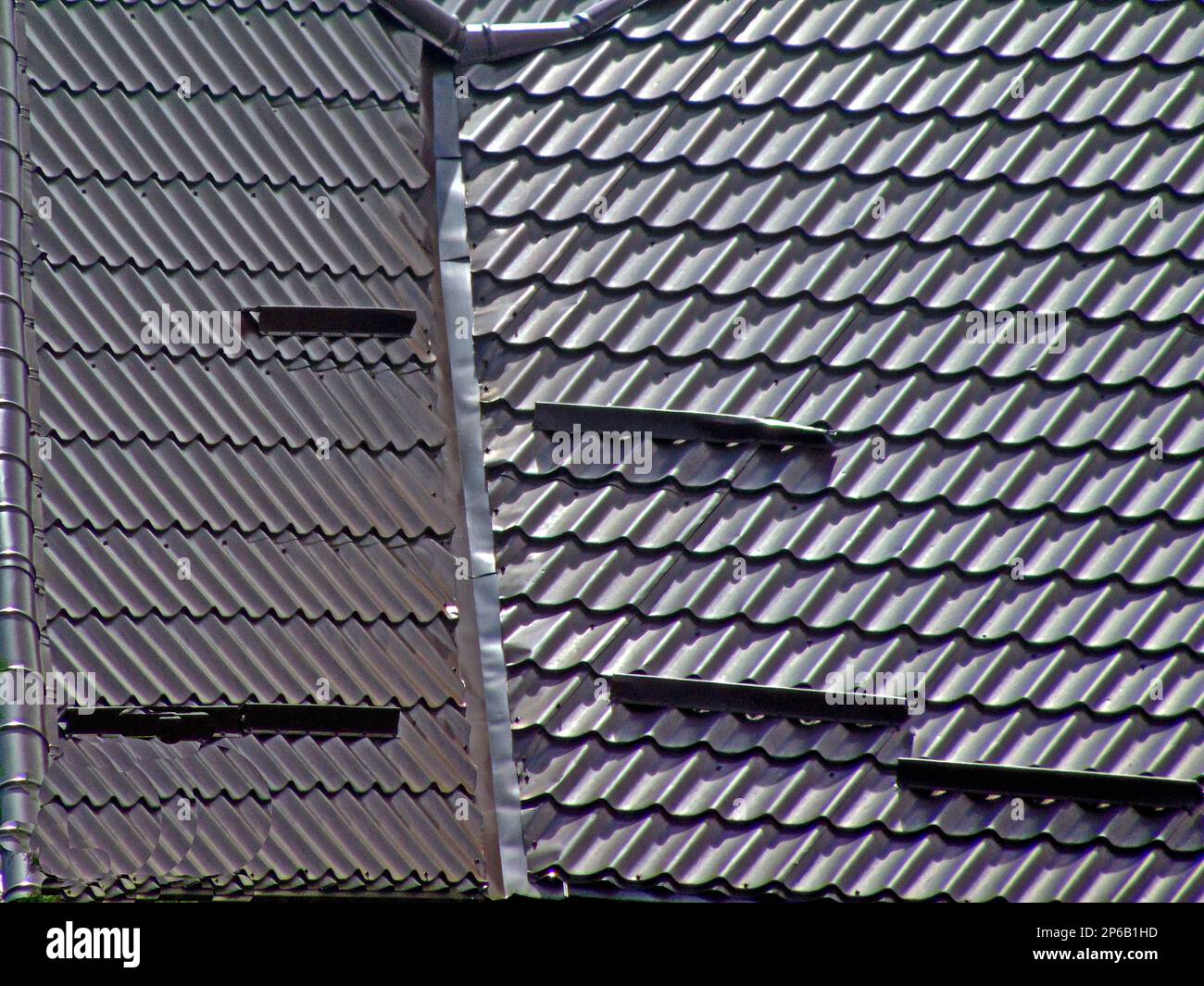 metal tile roof - building Stock Photo - Alamy