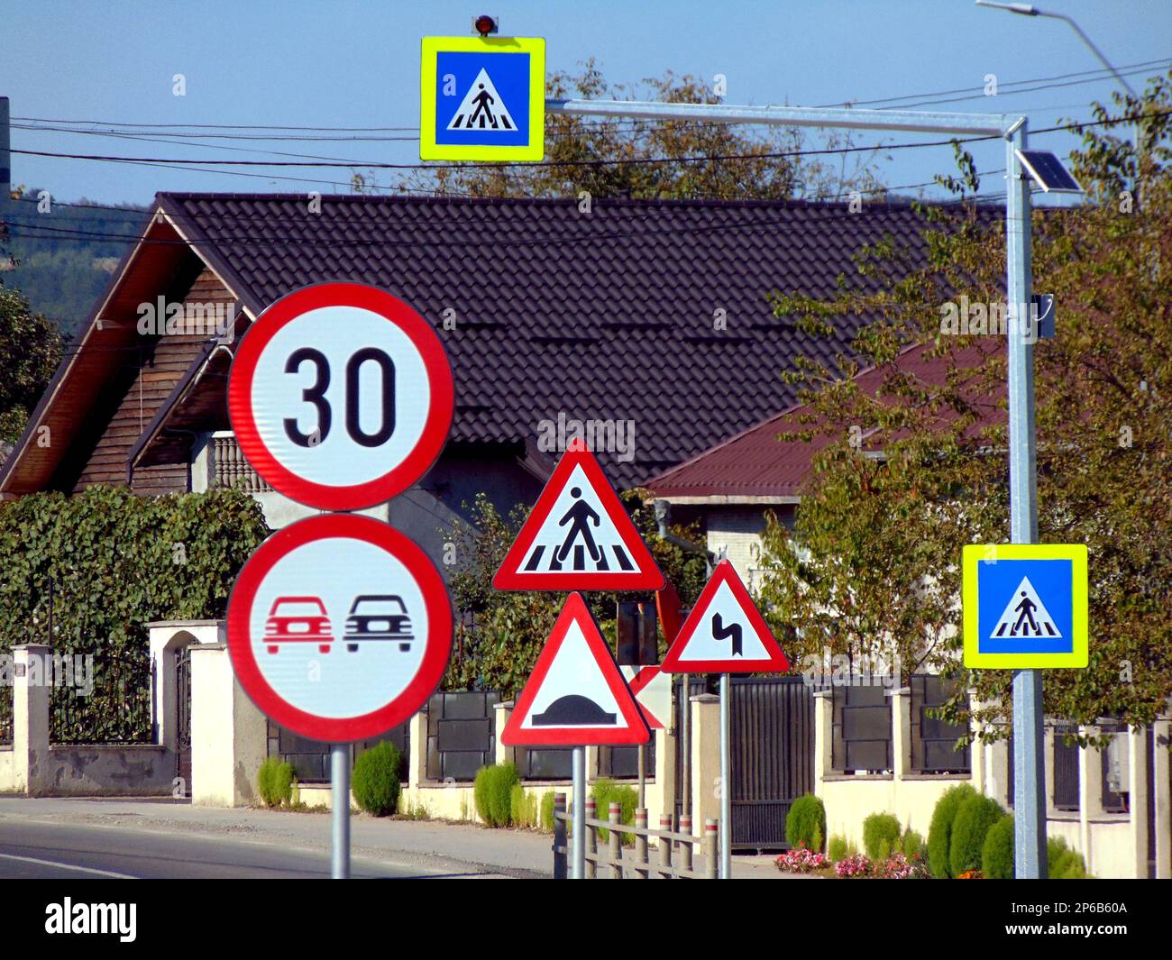more traffic signs on a street in Romania Stock Photo - Alamy