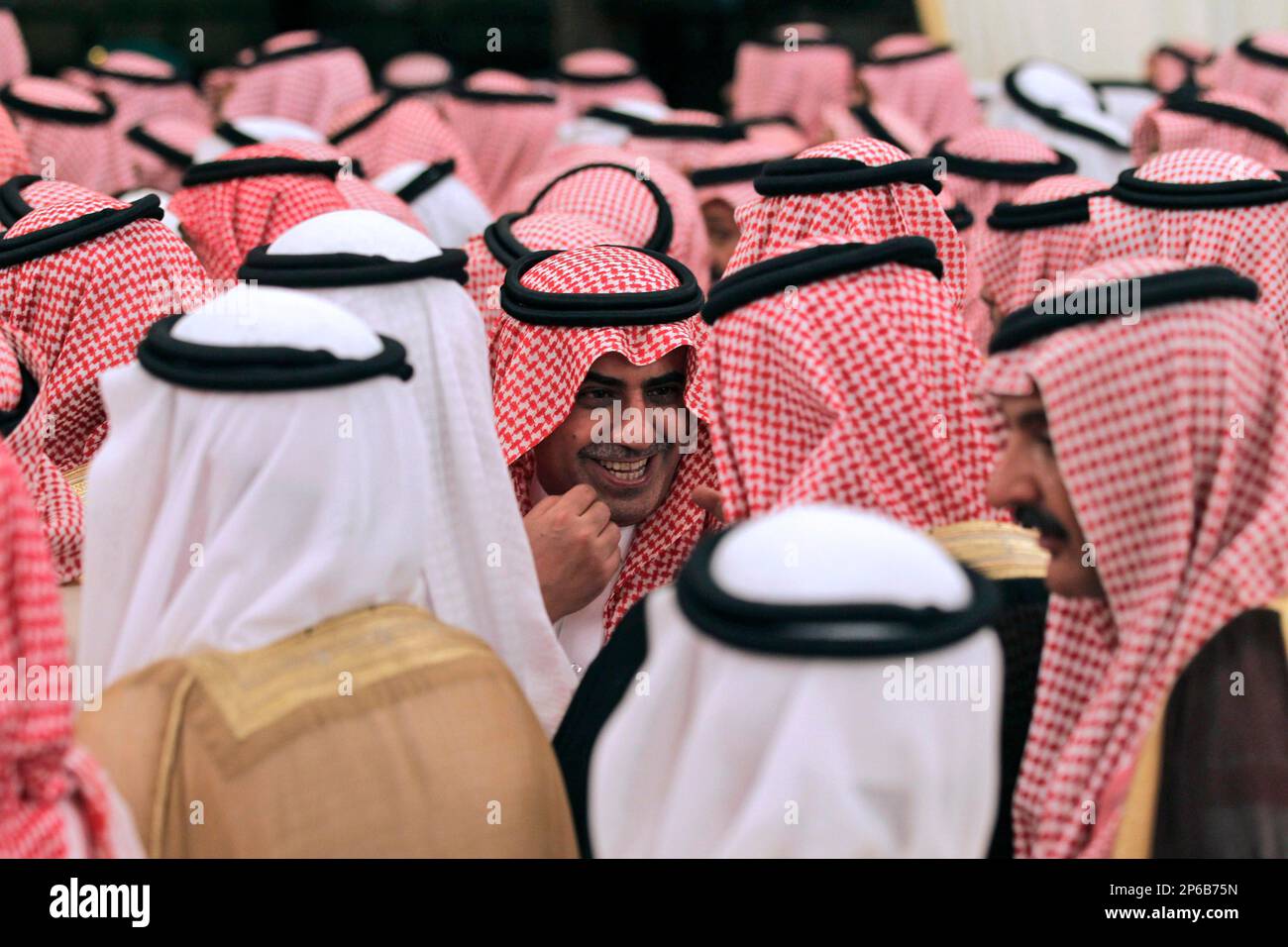 Saudi tribal chiefs crowd into a tent outside the royal palace in ...