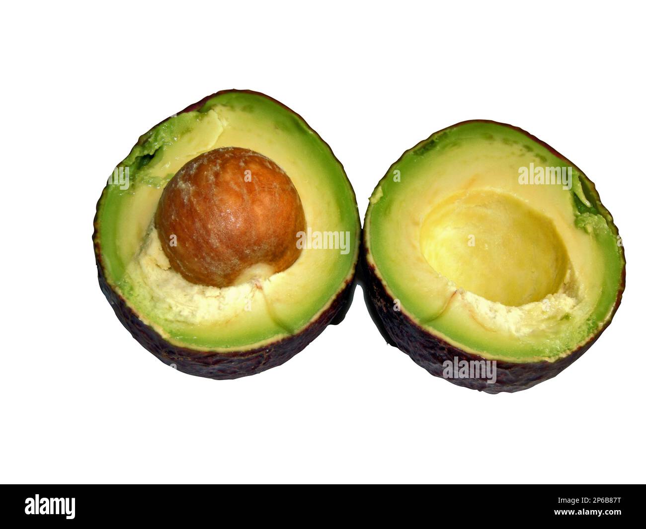avocado cut in half isolated on white Stock Photo - Alamy