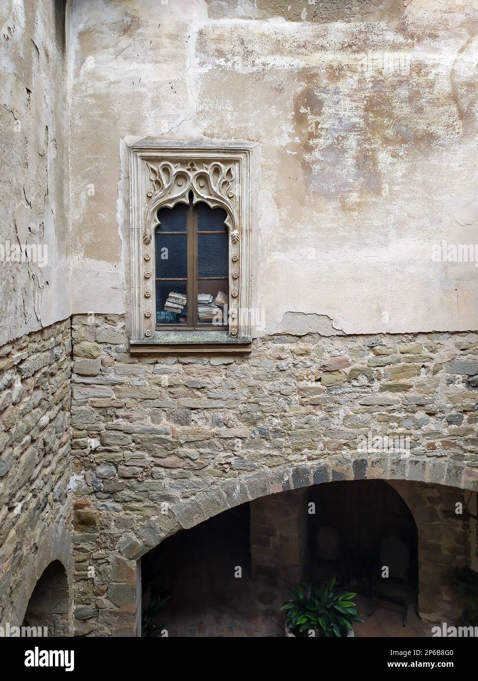 A stunning stone building, with arched windows Stock Photo - Alamy