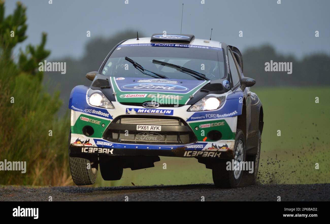 Jari-Matti Latvala (FIN) and co driver Mikko Antila (FIN) crest a rise ...