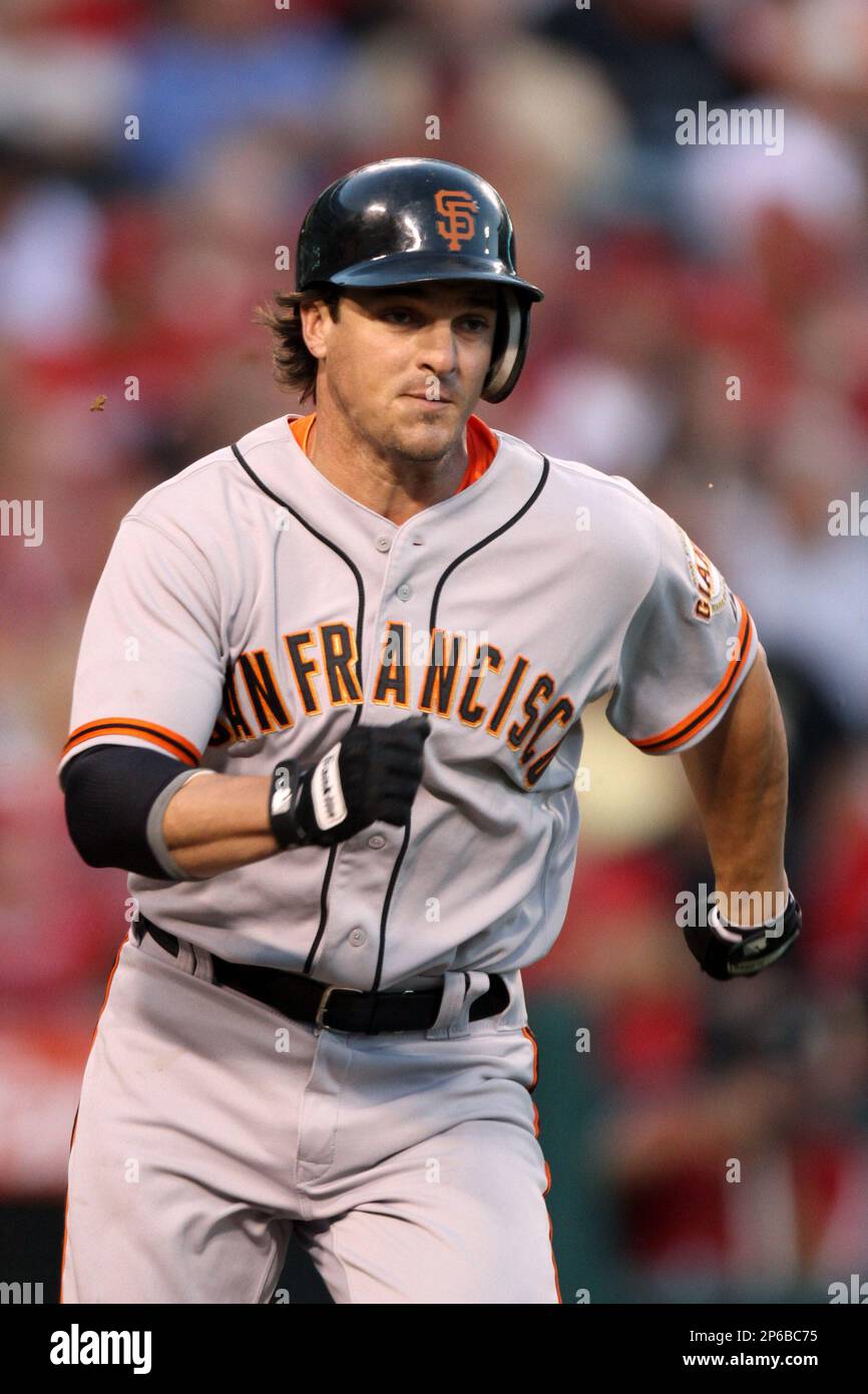 Ryan Theriot #5 of the San Francisco Giants runs the bases against the ...