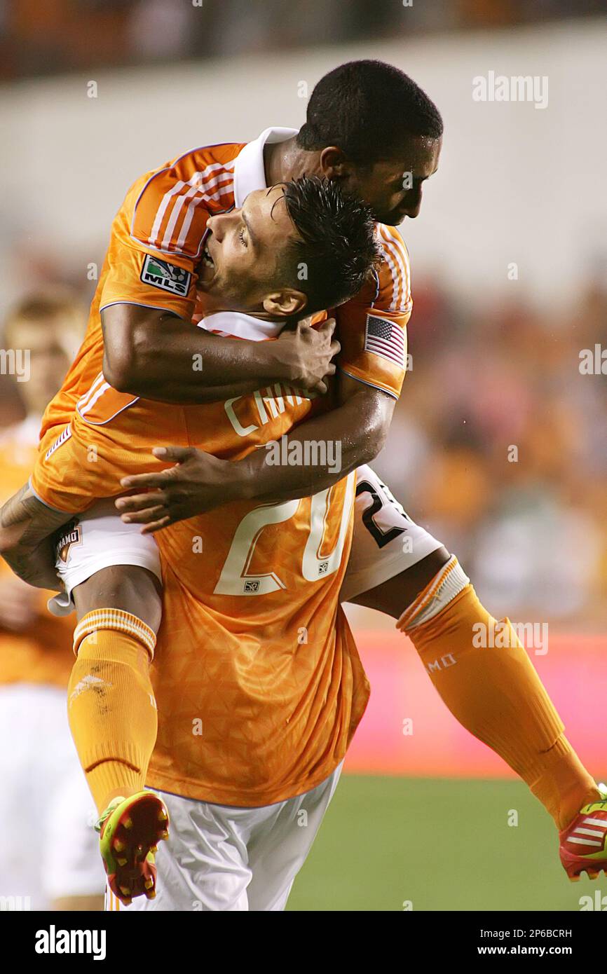 JUNE 20 2012: Houston Dynamo midfielder Geoff Cameron #20 and defender ...