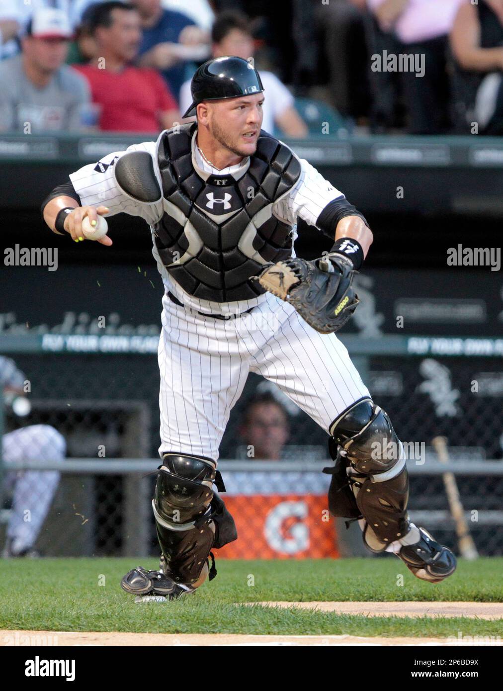 Chicago White Sox catcher Tyler Flowers looks to throw during an ...