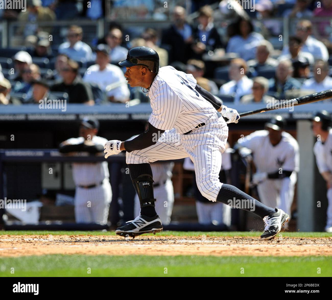 New York Yankees outfielder Curtis Granderson (14) hits a homerun ...