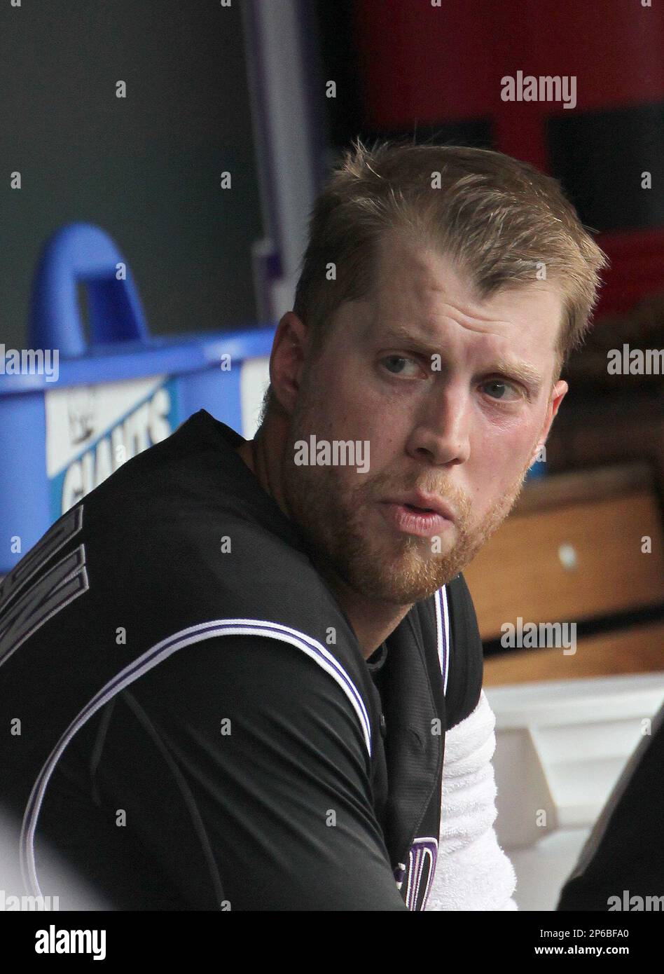 Colorado Rockies starting pitcher Josh Outman (88) takes a break in a ...