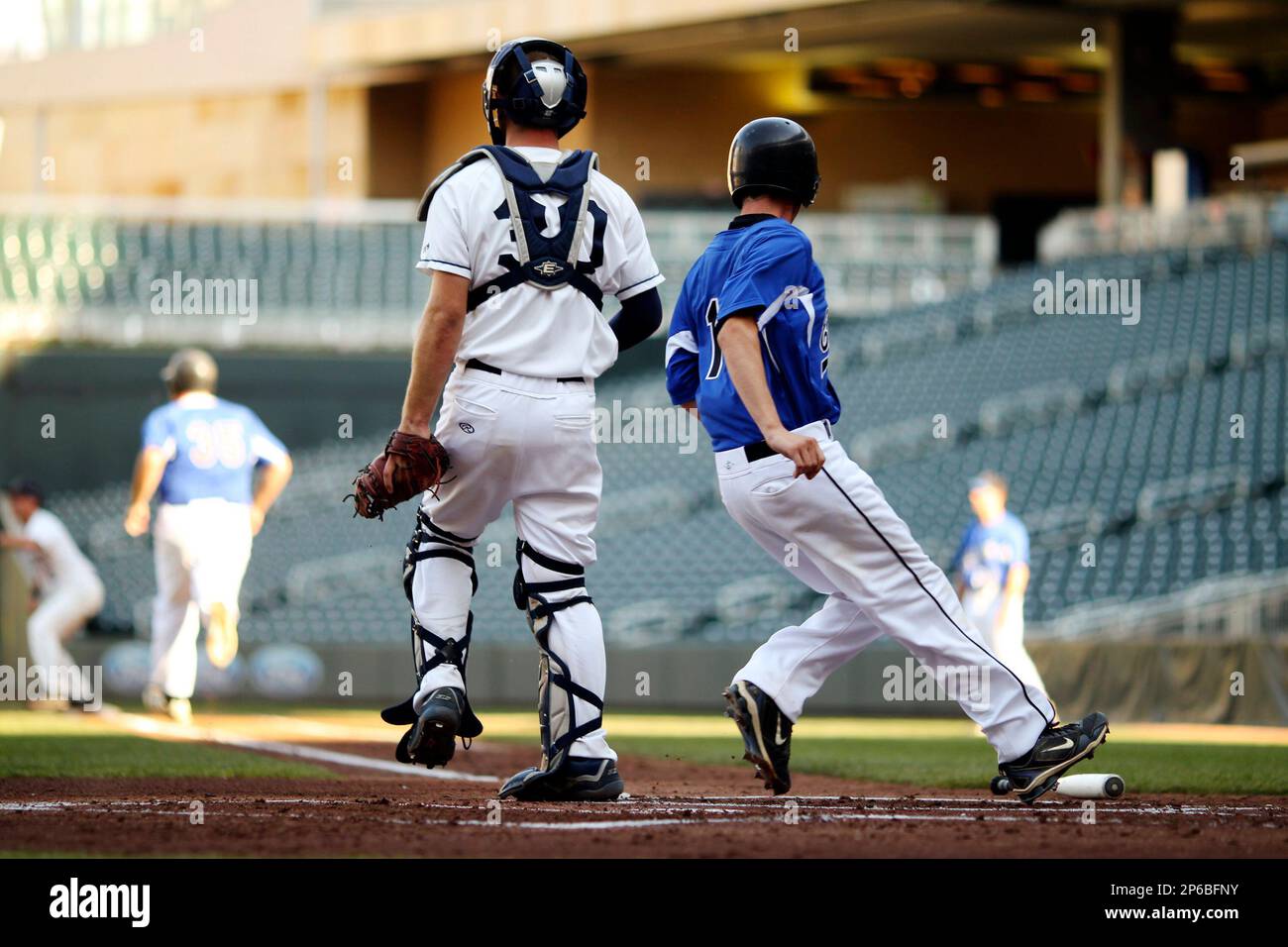 Eastview's E.J. Stevens scores against Bemidji during the second inning ...