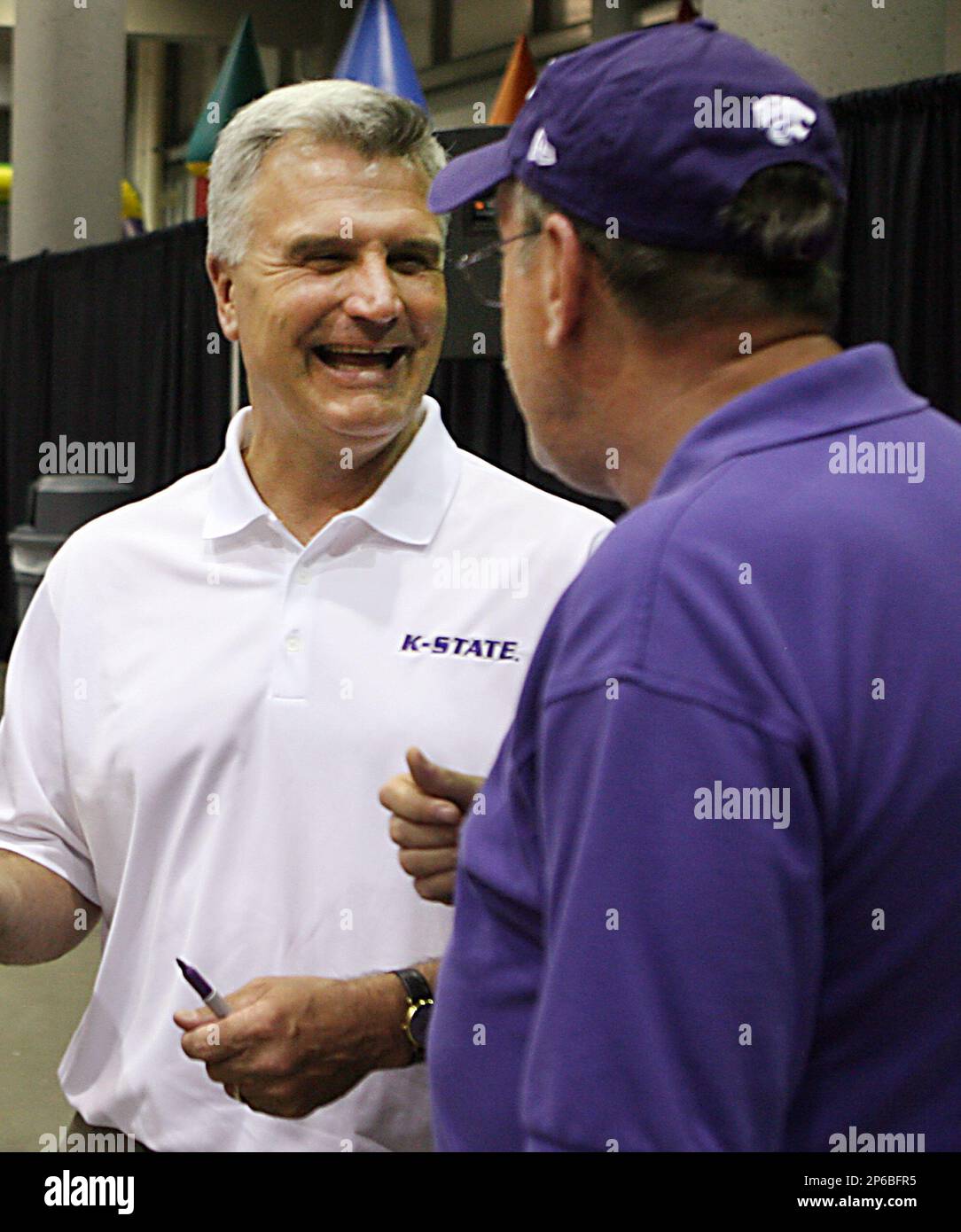 Bruce Weber, Kansas State's new men's basketball coach, left, talks ...