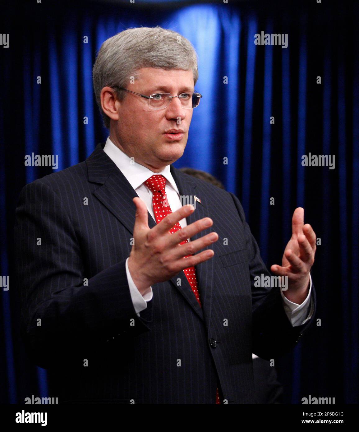 Canadian Prime Minister Stephen Harper speaks to reporters at the G-20 ...