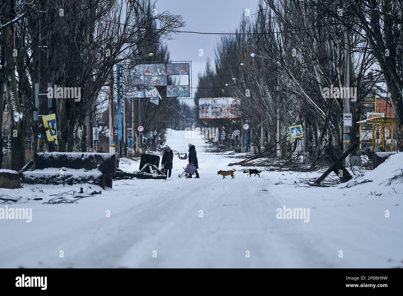 FILE - Local residents walk along a street in Bakhmut, Donetsk region ...