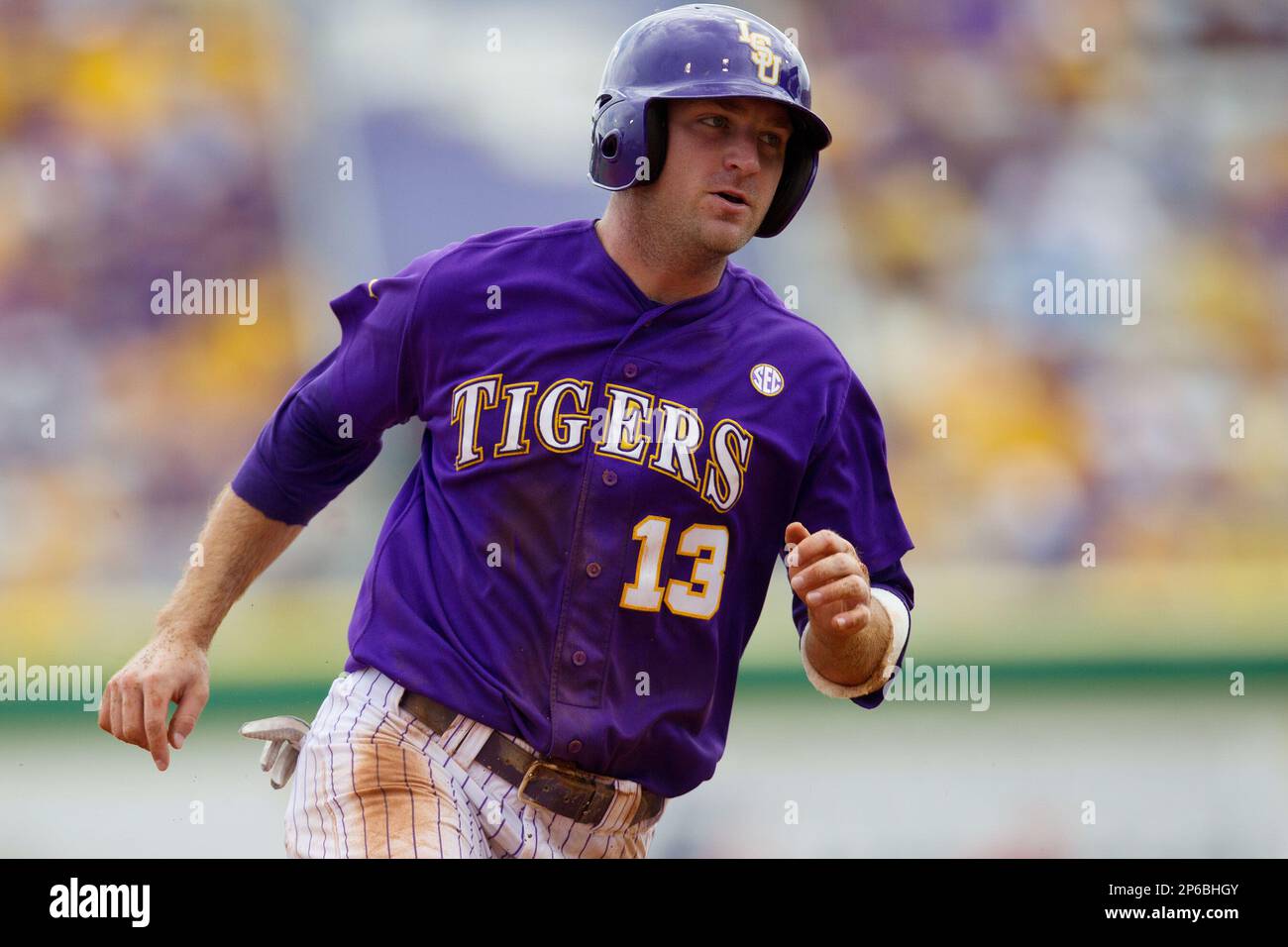 LSU Tigers outfielder Alex Edward #13 rounds second base during the ...