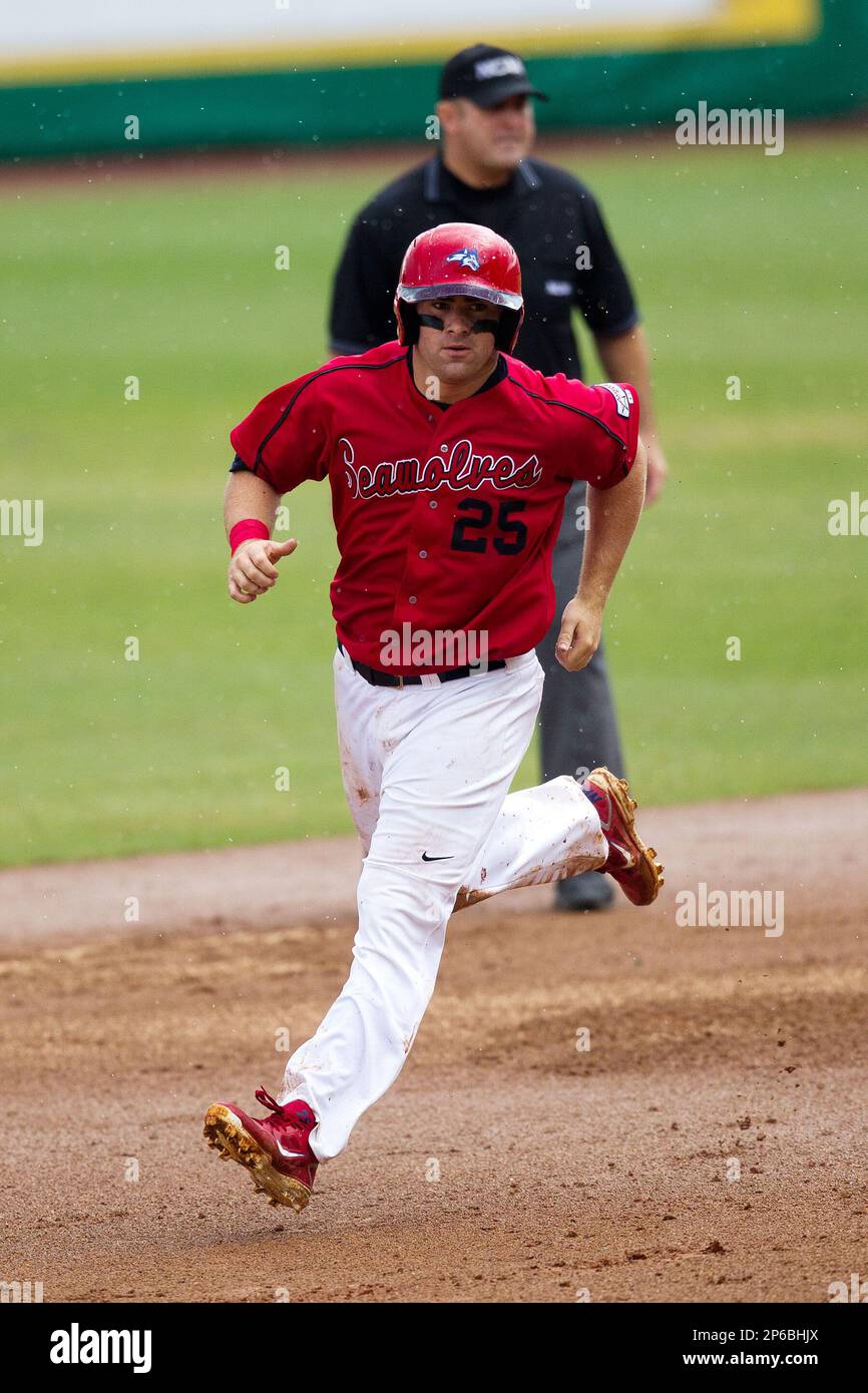 Stony Brook Seawolves first baseman Kevin Courtney #25 rounds the bases ...