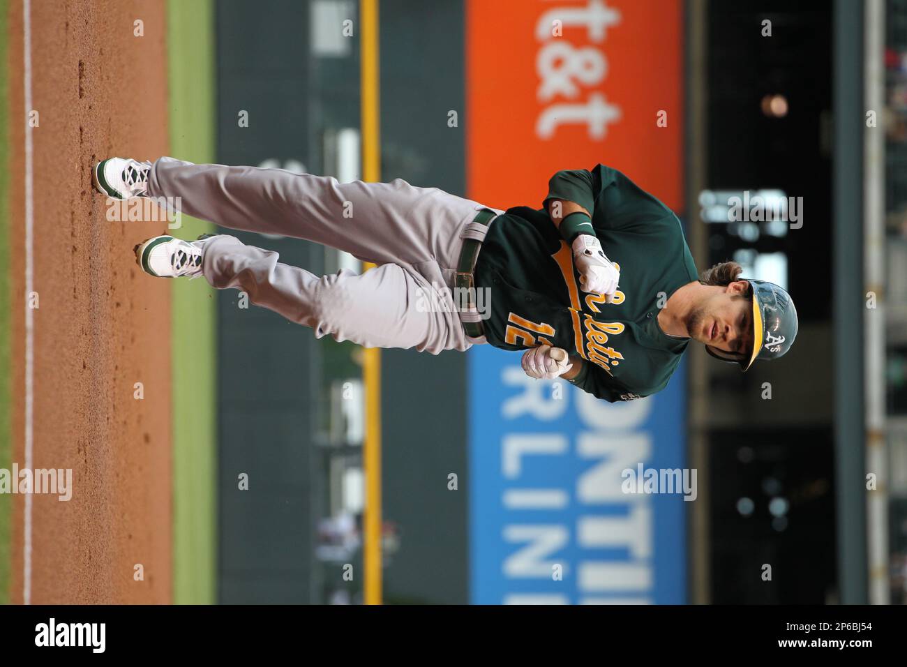 Oakland Athletics right fielder Collin Cowgill (12) rounds the bases in ...