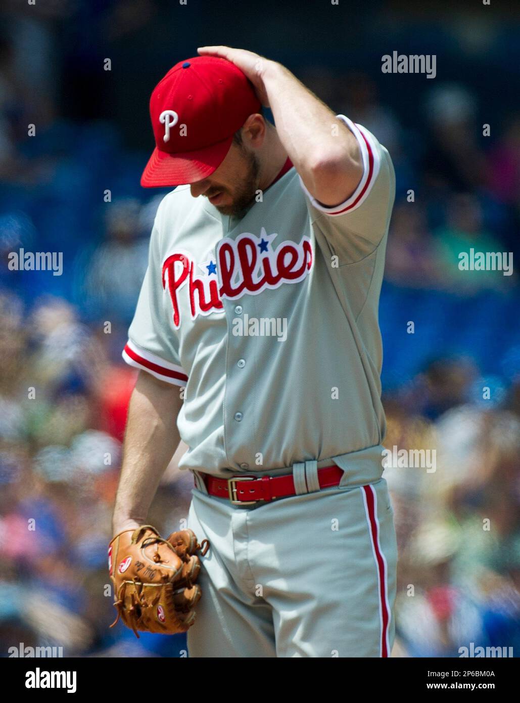 Philadelphia Phillies starting pitcher Cliff Lee looks reacts on the ...