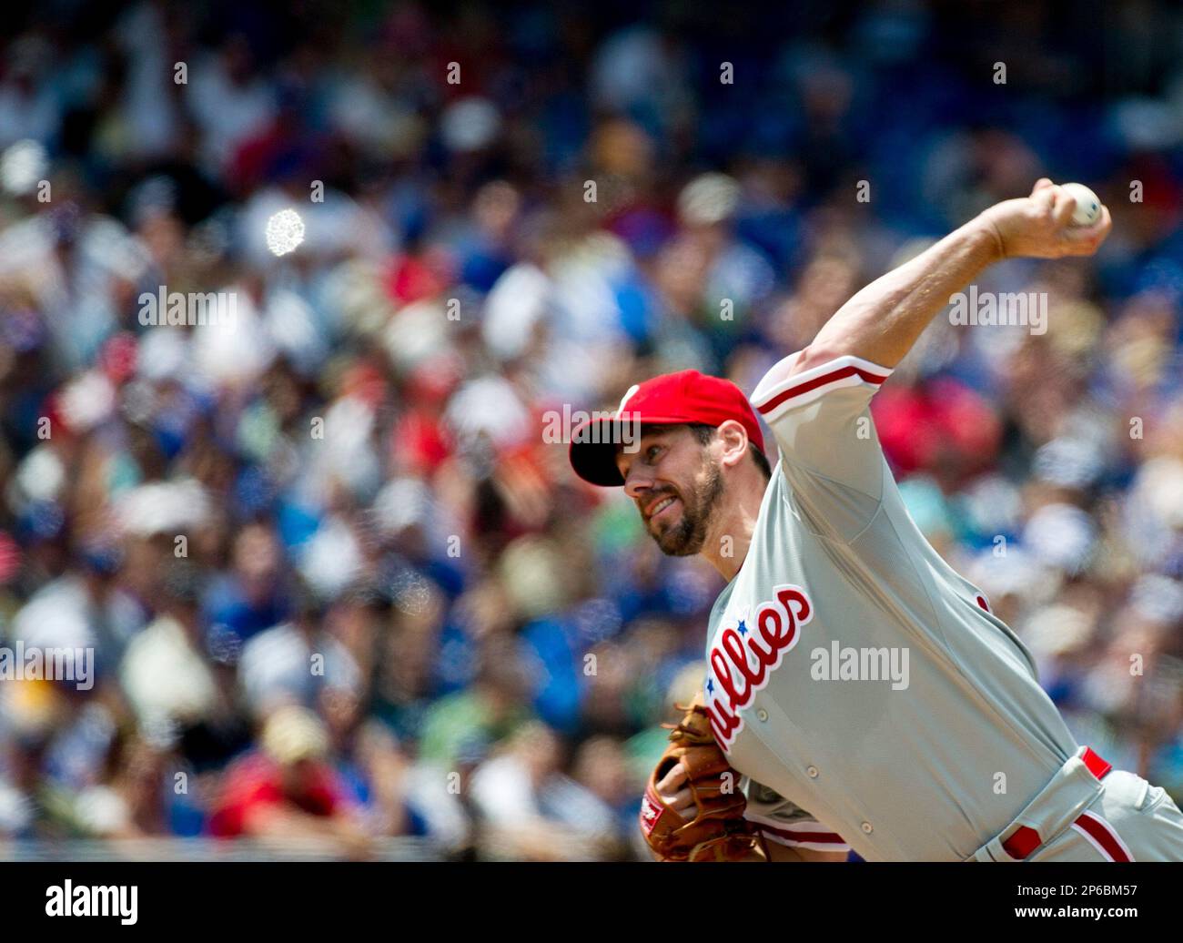 Philadelphia Phillies starting pitcher Cliff Lee throws Against the ...