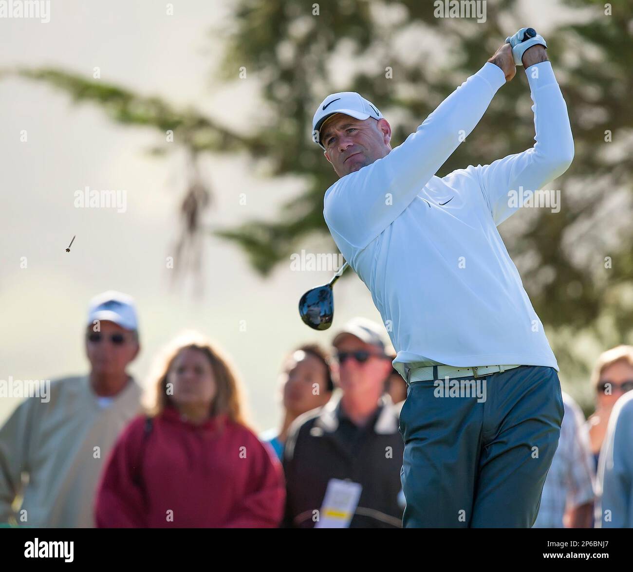 June 14, 2012: PGA golfer Stewart Cink tees off as his tee flies ...