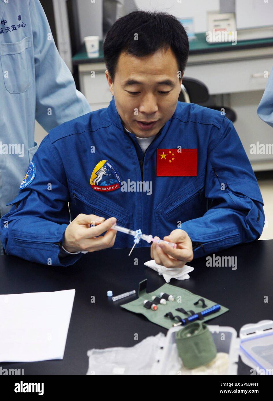 A file photo of Chinese astronaut Jing Haipeng studying in Beijing. The Shenzhou-9 manned ...