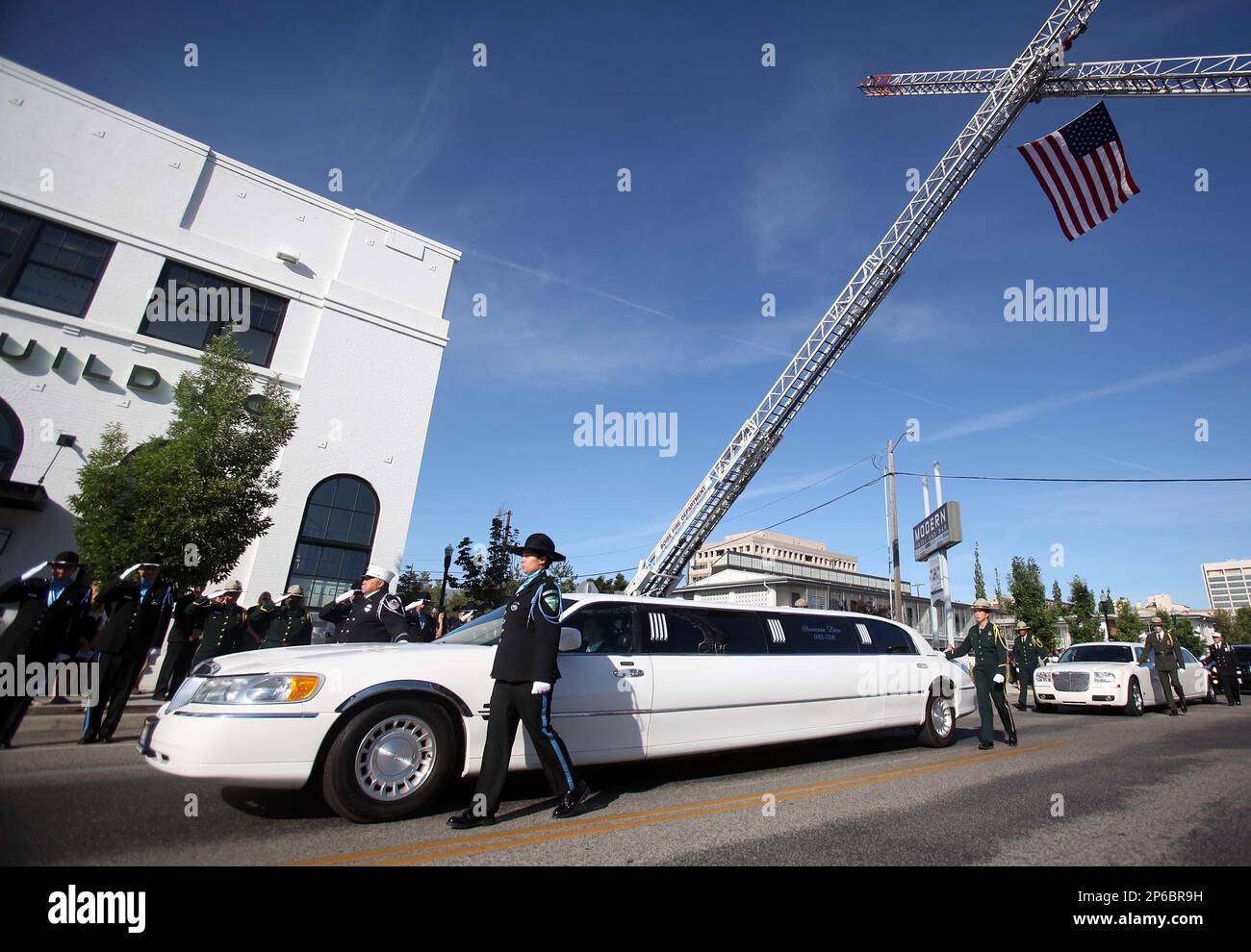 Two Boise Fire Department ladder trucks parked at 14th and Grove ...