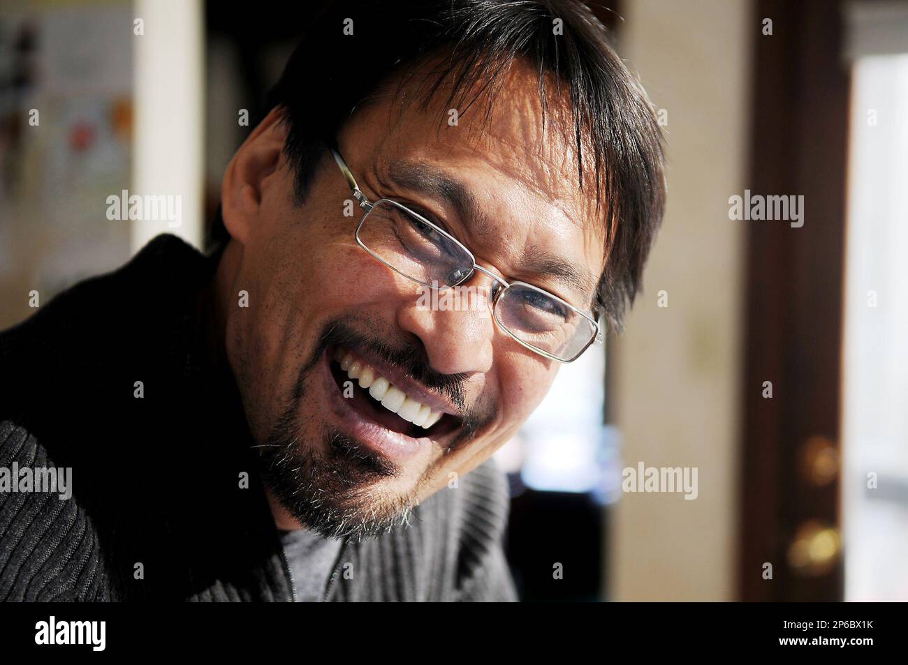 In this Jan. 26, 2012 photo, Michael Yap of Cross Point Ministries ...