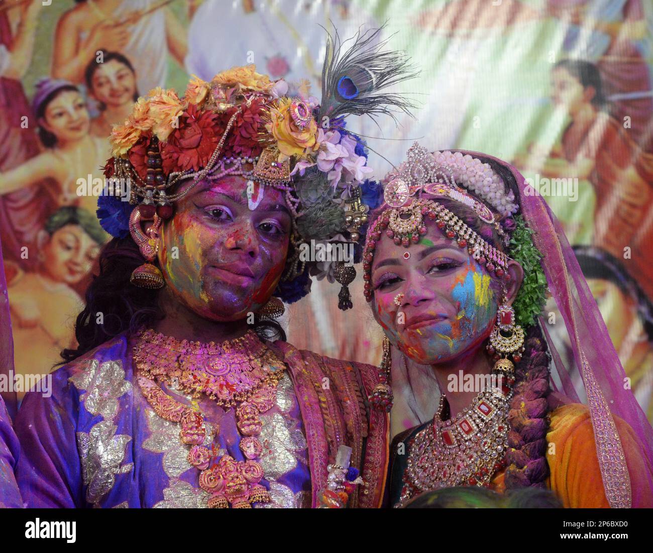 Kolkata, India: March 7, 2023, People smear color to a devotee dressed ...