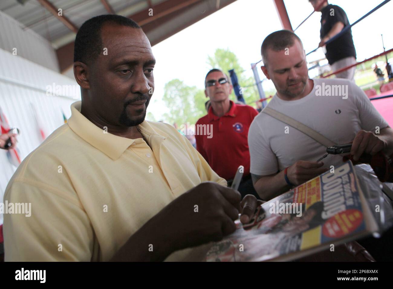 Inductee Thomas "Hitman" Hearns signs autographs during the 23rd Annual ...