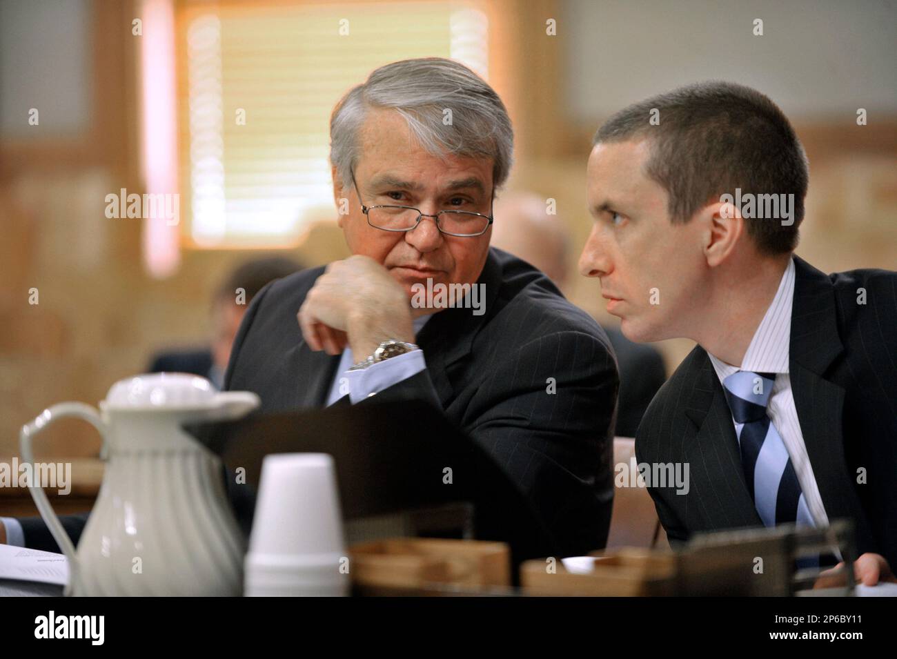 Miller-Canfield attorney Michael Hodge, left, talks with a fellow ...