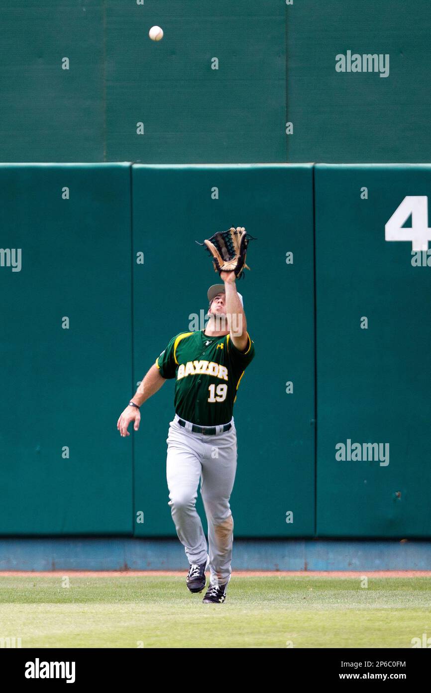 Baylor Bears outfielder Logan Vick #19 makes a catch during the NCAA ...