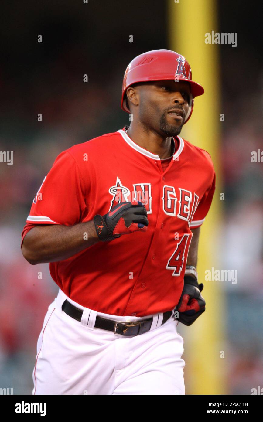 Torii Hunter #48 of the Los Angeles Angels runs the bases against the ...
