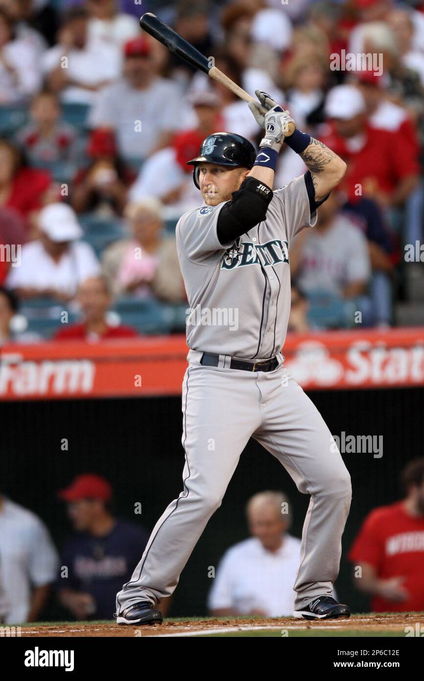 Mike Carp #20 of the Seattle Mariners bats against the Los Angeles ...