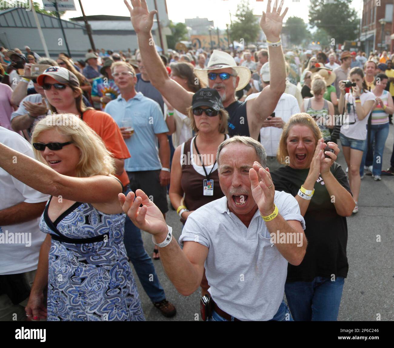 Fans cheer for Joe Louis Walker at the trestle stage along M.L. King ...