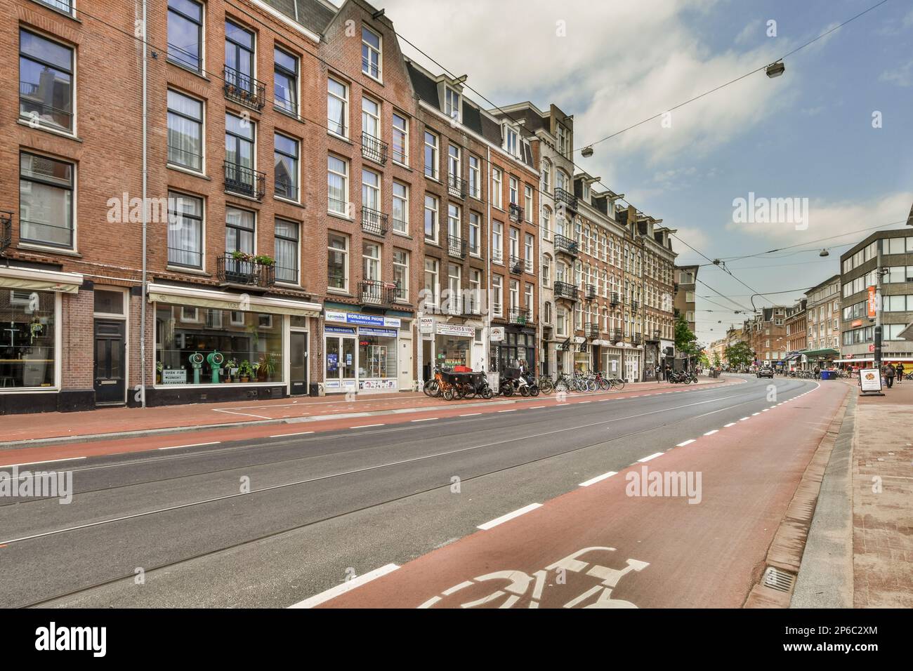 Amsterdam, Netherlands - 10 April, 2021: a city street with buildings ...