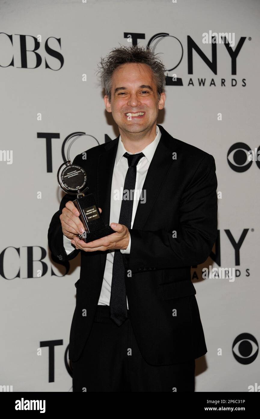 Martin Lowe poses with his award in the press room at the 66th annual ...