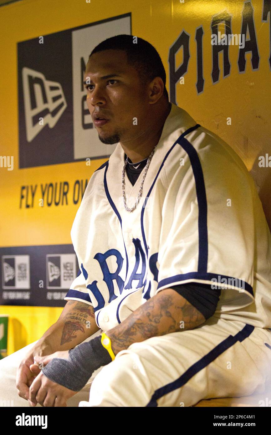 June 09, 2012: Jose Tabata #31 of the Pirates watches from the dugout ...