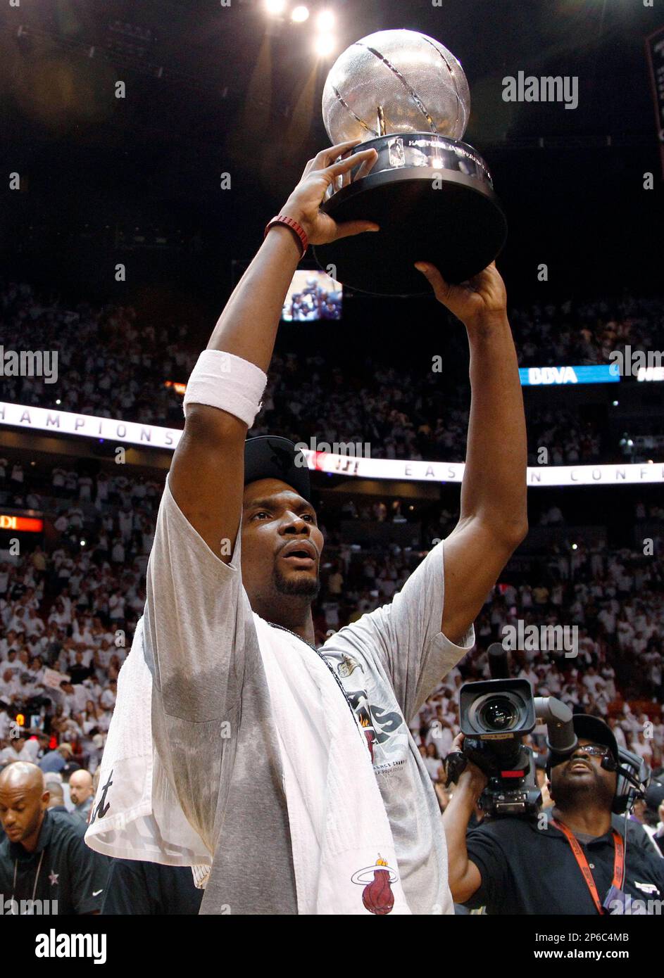 Miami Heat's Chris Bosh holds the NBA's Eastern Conference trophy after ...